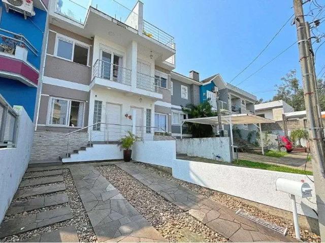 Casa / Sobrado para Venda em Porto Alegre/RS Hípica 3 Quartos