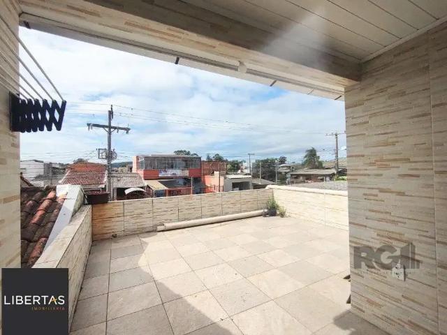 Casa / Sobrado para Venda em Porto Alegre/RS Hípica 3 Quartos
