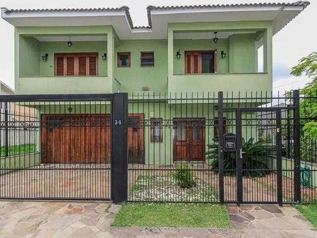 Casa / Sobrado para Venda em Porto Alegre/RS Hípica 3 Quartos
