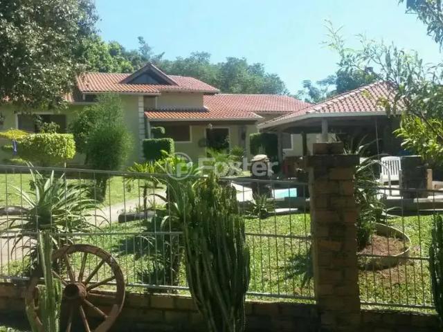 Casa / Sobrado para Venda em Porto Alegre/RS Hípica 4 Quartos