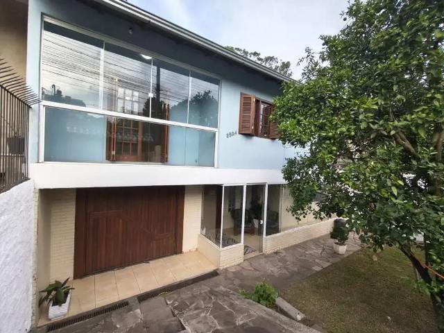 Casa / Sobrado para Venda em Porto Alegre/RS Hípica 4 Quartos