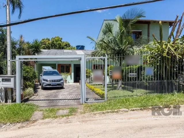 Casa / Sobrado para Venda em Porto Alegre/RS Hípica 4 Quartos