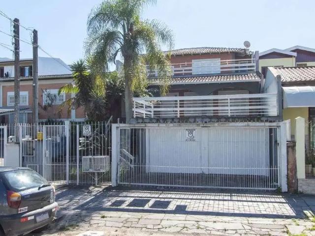 Casa / Sobrado para Venda em Porto Alegre/RS Hípica 4 Quartos