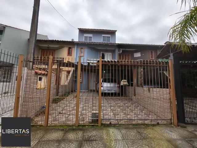 Casa / Sobrado para Venda em Porto Alegre/RS Hípica 4 Quartos