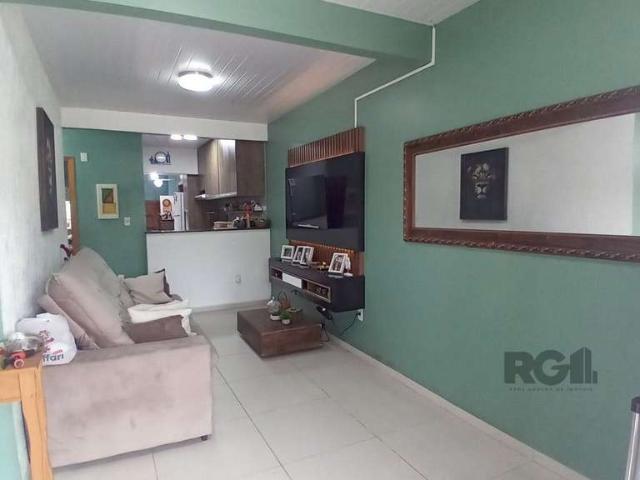 Casa / Sobrado para Venda em Porto Alegre/RS Hípica 4 Quartos
