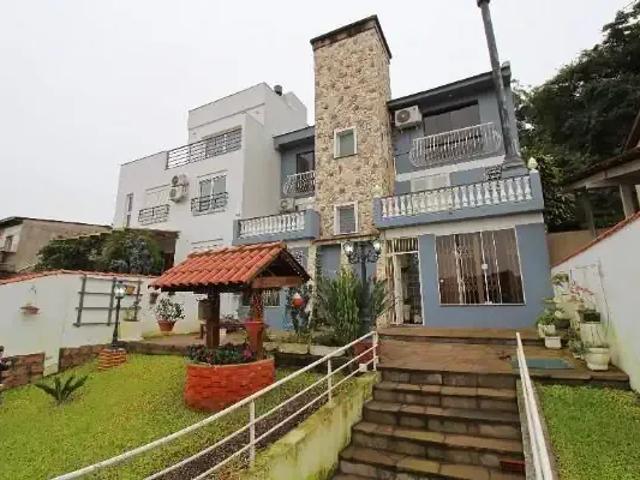 Casa / Sobrado para Venda em Porto Alegre/RS Ipanema 3 Quartos