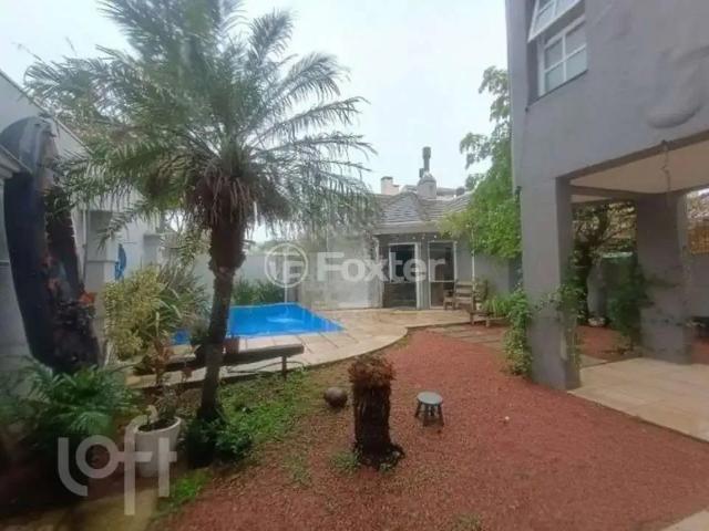 Casa / Sobrado para Venda em Porto Alegre/RS Ipanema 4 Quartos