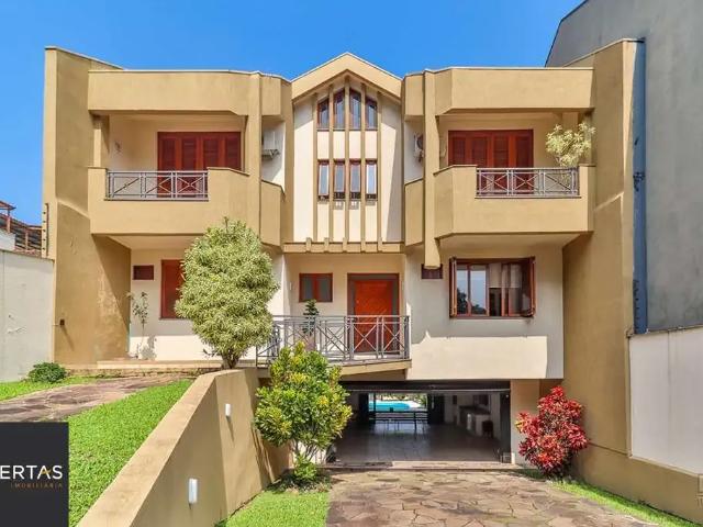Casa / Sobrado para Venda em Porto Alegre/RS Ipanema 4 Quartos