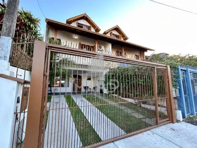 Casa / Sobrado para Venda em Porto Alegre/RS Ipanema 4 Quartos
