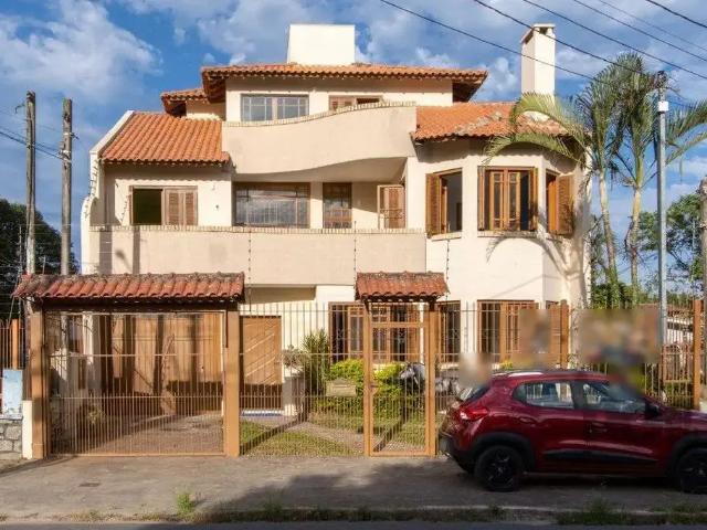 Casa / Sobrado para Venda em Porto Alegre/RS Ipanema 4 Quartos