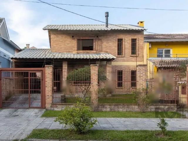 Casa / Sobrado para Venda em Porto Alegre/RS Ipanema 4 Quartos
