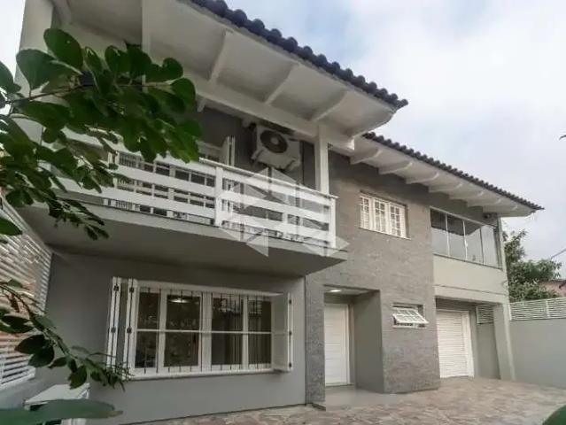 Casa / Sobrado para Venda em Porto Alegre/RS Ipanema 4 Quartos