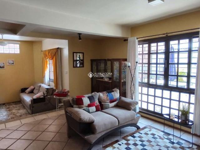Casa / Sobrado para Venda em Porto Alegre/RS Jardim Botânico 3 Quartos