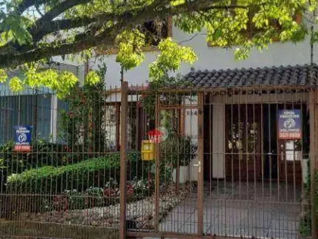 Casa / Sobrado para Venda em Porto Alegre/RS Jardim Botânico 3 Quartos