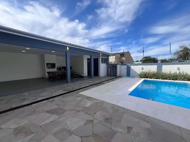 Casa / Sobrado para Venda em Porto Alegre/RS Jardim Europa 3 Quartos