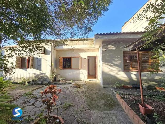Casa / Sobrado para Venda em Porto Alegre/RS Jardim Floresta 3 Quartos