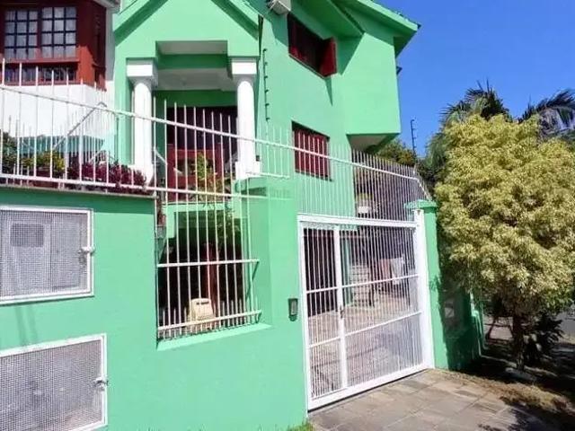 Casa / Sobrado para Venda em Porto Alegre/RS Jardim Floresta 3 Quartos