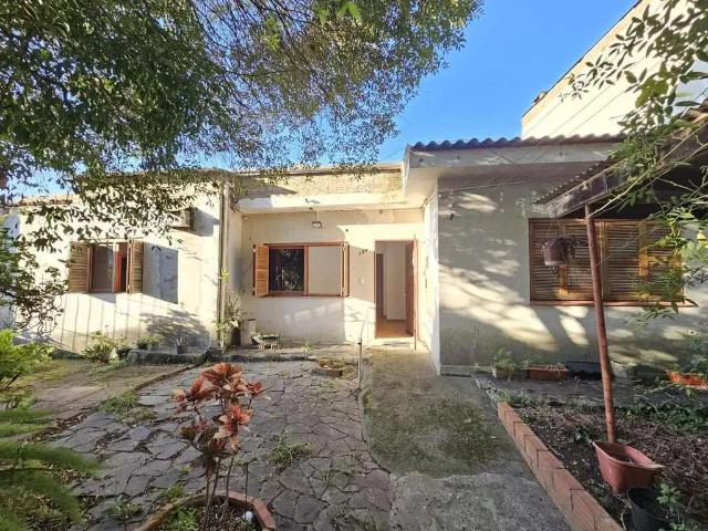 Casa / Sobrado para Venda em Porto Alegre/RS Jardim Floresta 3 Quartos