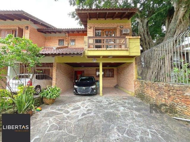 Casa / Sobrado para Venda em Porto Alegre/RS Jardim Isabel 3 Quartos