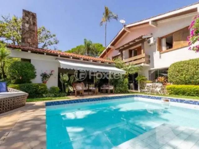 Casa / Sobrado para Venda em Porto Alegre/RS Jardim Isabel 3 Quartos