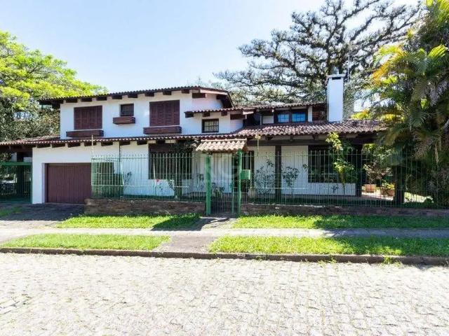 Casa / Sobrado para Venda em Porto Alegre/RS Jardim Isabel 4 Quartos