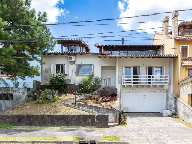 Casa / Sobrado para Venda em Porto Alegre/RS Jardim Isabel 4 Quartos