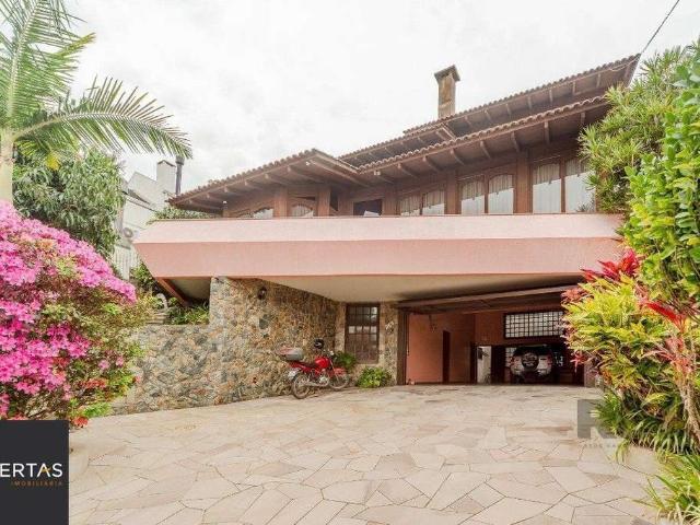 Casa / Sobrado para Venda em Porto Alegre/RS Jardim Isabel 4 Quartos