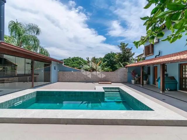 Casa / Sobrado para Venda em Porto Alegre/RS Jardim Isabel 4 Quartos