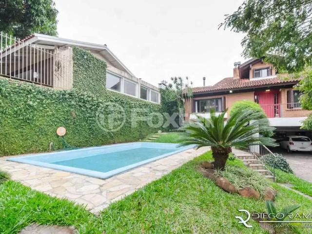Casa / Sobrado para Venda em Porto Alegre/RS Jardim Isabel 4 Quartos
