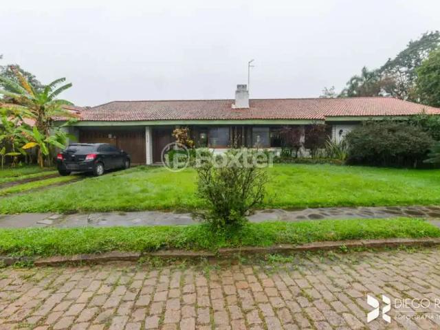 Casa / Sobrado para Venda em Porto Alegre/RS Jardim Isabel 4 Quartos