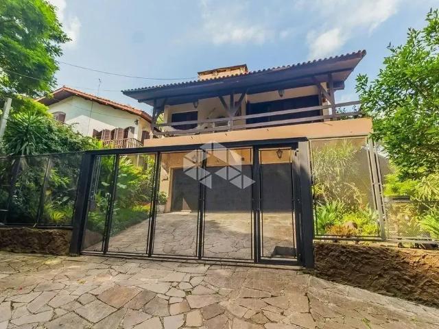Casa / Sobrado para Venda em Porto Alegre/RS Jardim Isabel 7 Quartos