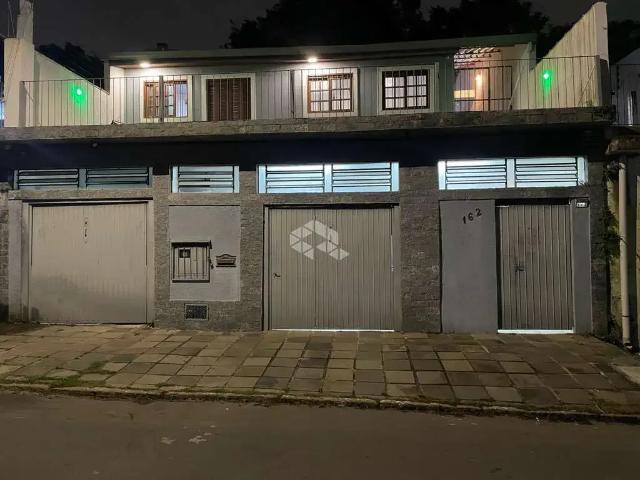Casa / Sobrado para Venda em Porto Alegre/RS Jardim Itu Sabará 3 Quartos