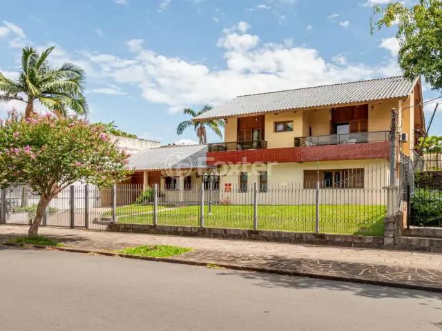 Casa / Sobrado para Venda em Porto Alegre/RS Jardim Lindóia 5 Quartos