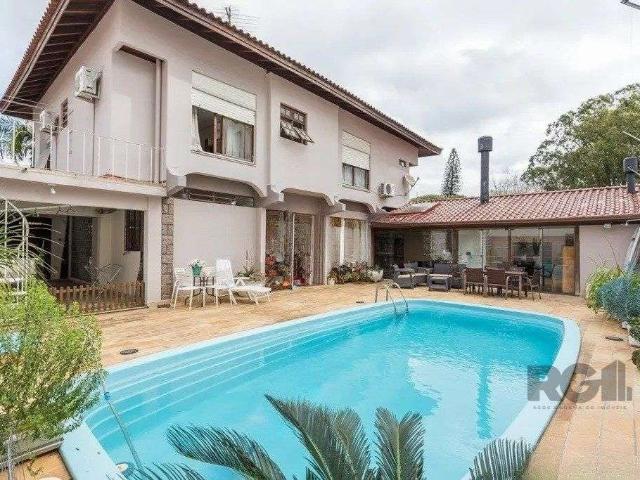 Casa / Sobrado para Venda em Porto Alegre/RS Jardim Lindóia 3 Quartos