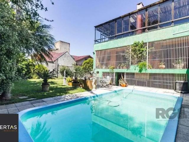 Casa / Sobrado para Venda em Porto Alegre/RS Jardim São Pedro 4 Quartos