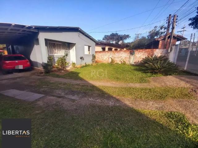 Casa / Sobrado para Venda em Porto Alegre/RS Lami 5 Quartos