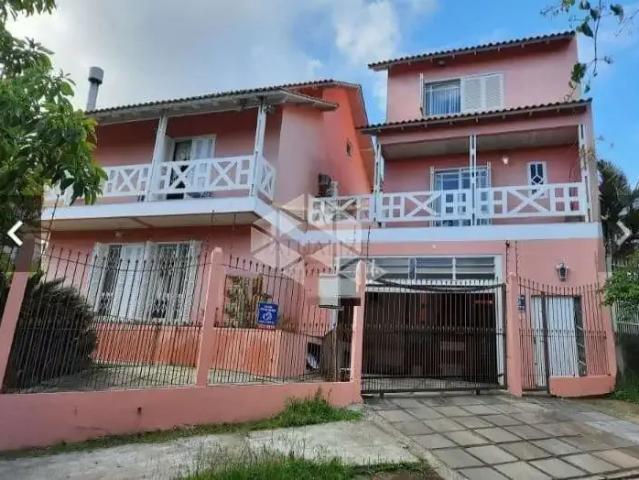 Casa / Sobrado para Venda em Porto Alegre/RS Lomba do Pinheiro 5 Quartos