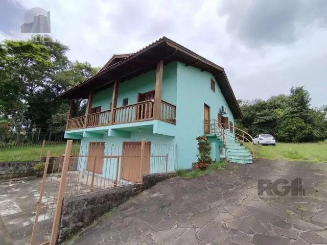 Casa / Sobrado para Venda em Porto Alegre/RS Lomba do Pinheiro 3 Quartos