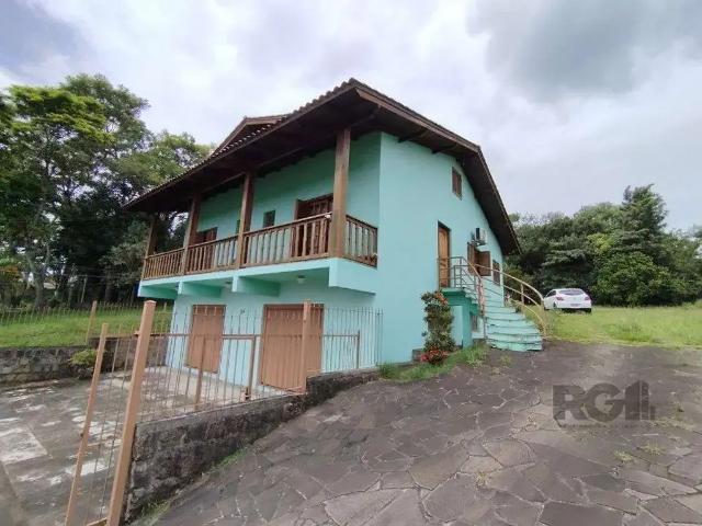 Casa / Sobrado para Venda em Porto Alegre/RS Lomba do Pinheiro 3 Quartos