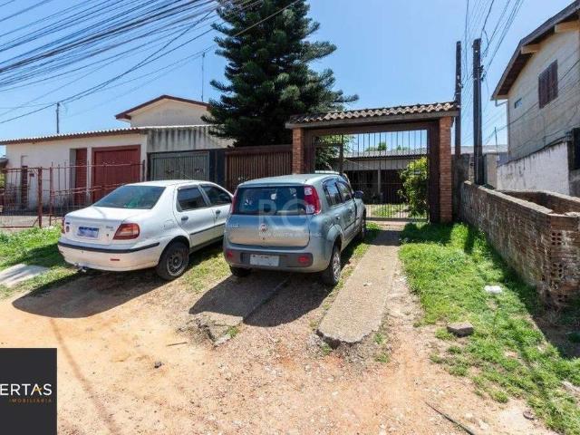 Casa / Sobrado para Venda em Porto Alegre/RS Lomba do Pinheiro 3 Quartos