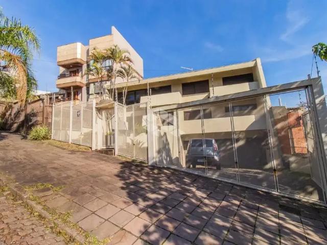 Casa / Sobrado para Venda em Porto Alegre/RS Menino Deus 4 Quartos