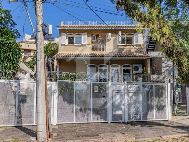 Casa / Sobrado para Venda em Porto Alegre/RS Menino Deus 4 Quartos