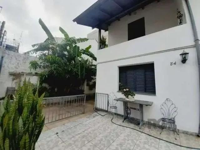 Casa / Sobrado para Venda em Porto Alegre/RS Menino Deus 4 Quartos