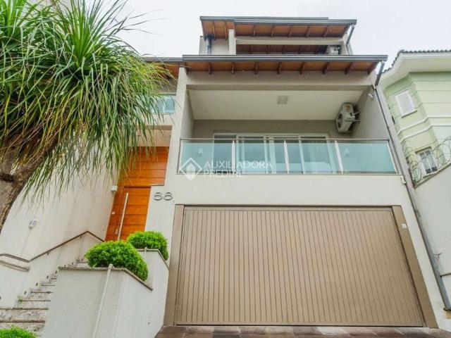 Casa / Sobrado para Venda em Porto Alegre/RS Menino Deus 6 Quartos