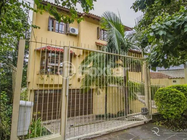 Casa / Sobrado para Venda em Porto Alegre/RS Medianeira 4 Quartos
