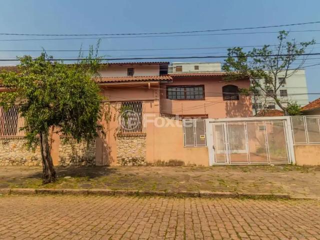 Casa / Sobrado para Venda em Porto Alegre/RS Medianeira 4 Quartos