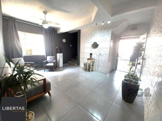 Casa / Sobrado para Venda em Porto Alegre/RS Navegantes 4 Quartos