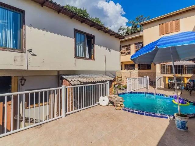 Casa / Sobrado para Venda em Porto Alegre/RS Nonoai 4 Quartos