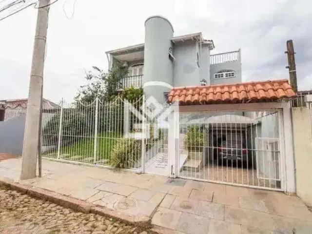 Casa / Sobrado para Venda em Porto Alegre/RS Partenon 4 Quartos