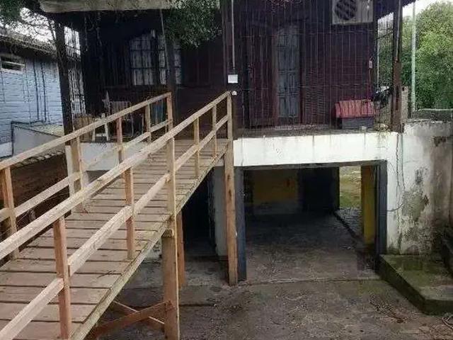 Casa / Sobrado para Venda em Porto Alegre/RS Partenon 4 Quartos